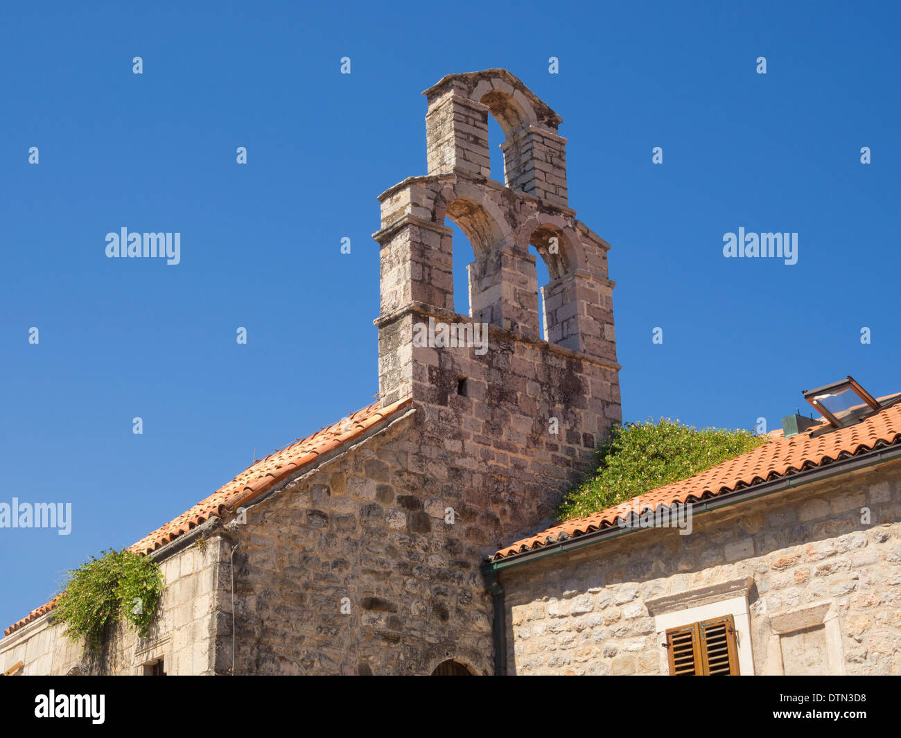 small chapel with bell tower under bright sunny sky Stock Photo - Alamy
