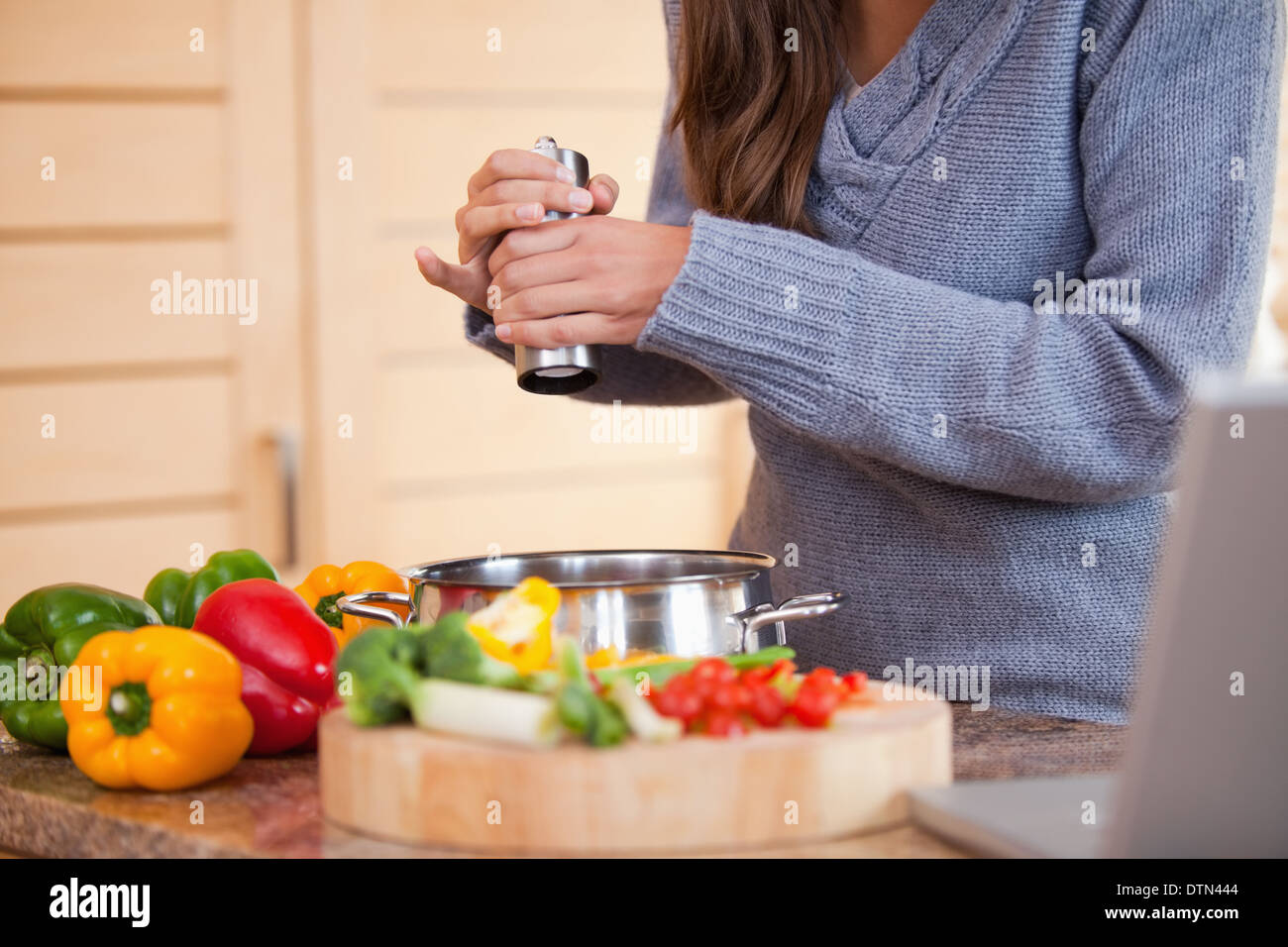 Beautiful woman chopping ingredients salad hi-res stock photography and ...