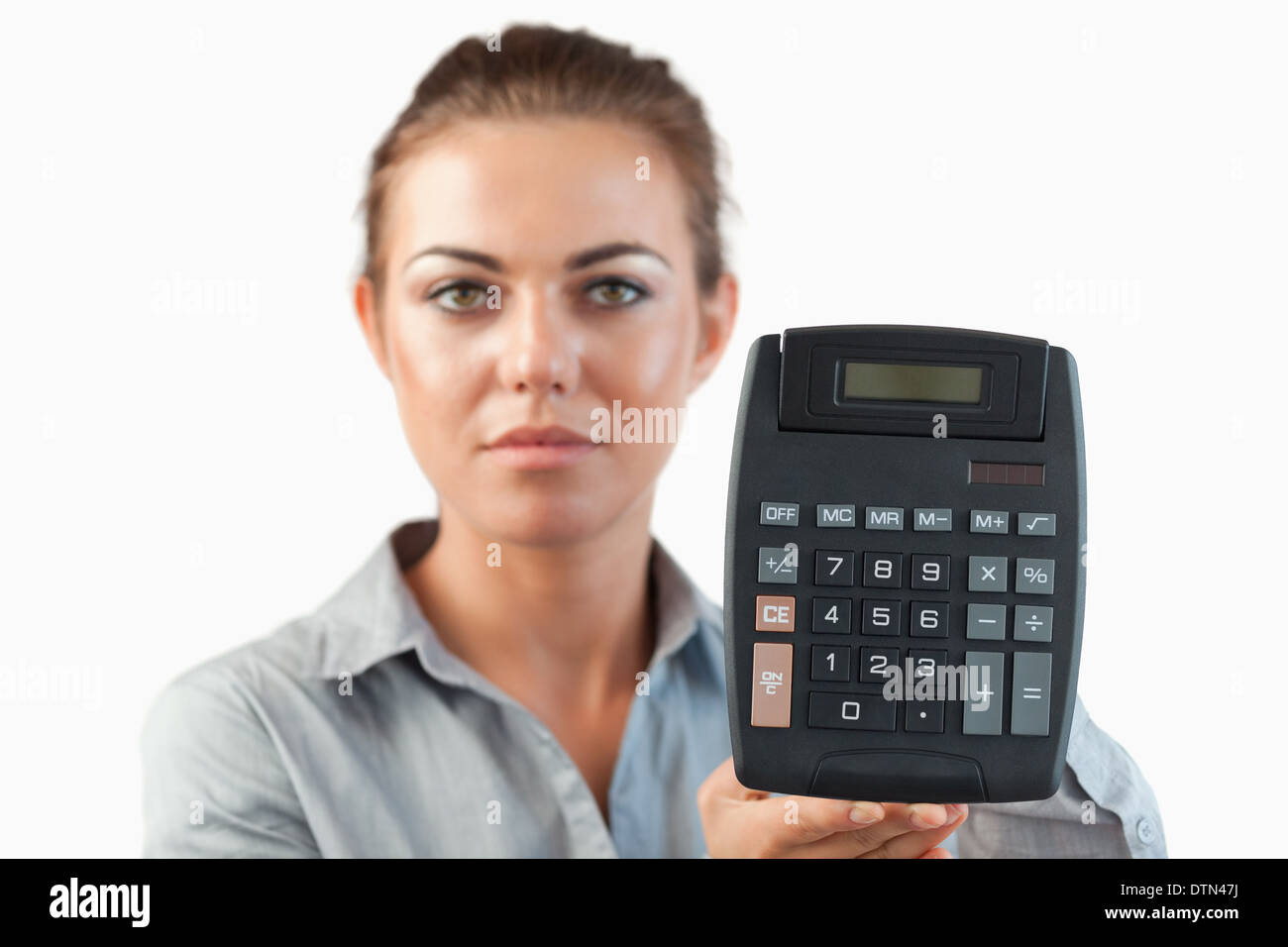 Female accountant presenting calculator Stock Photo - Alamy