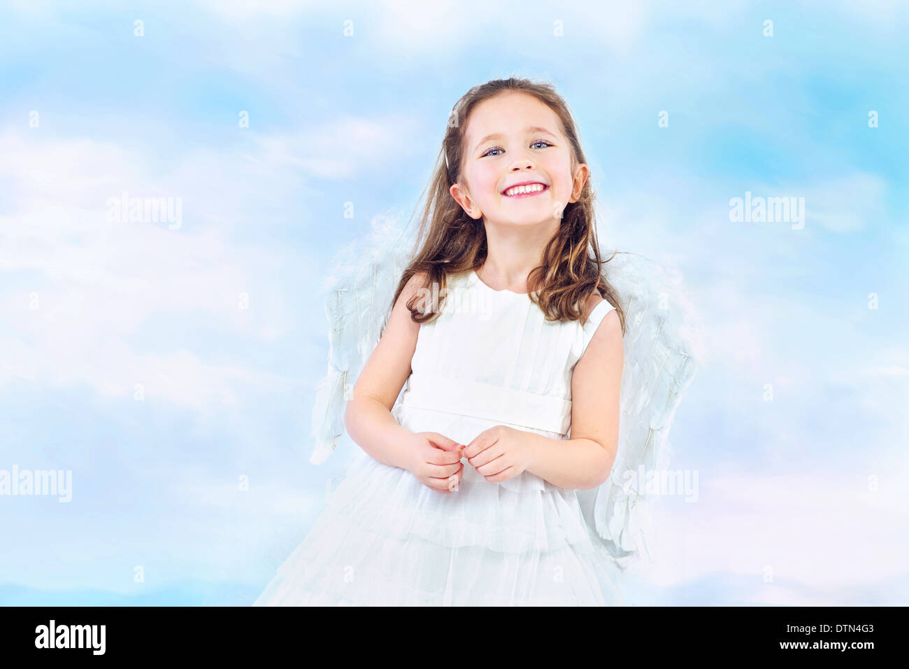 Cute little princess with pretty wide smile Stock Photo - Alamy