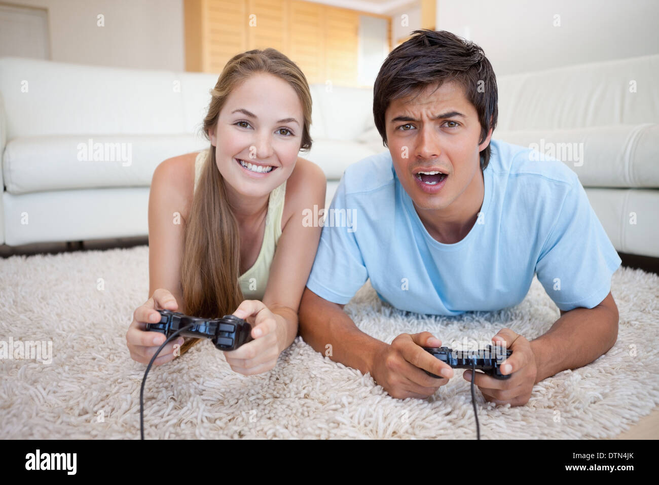 Women enjoying video games together hi-res stock photography and images ...