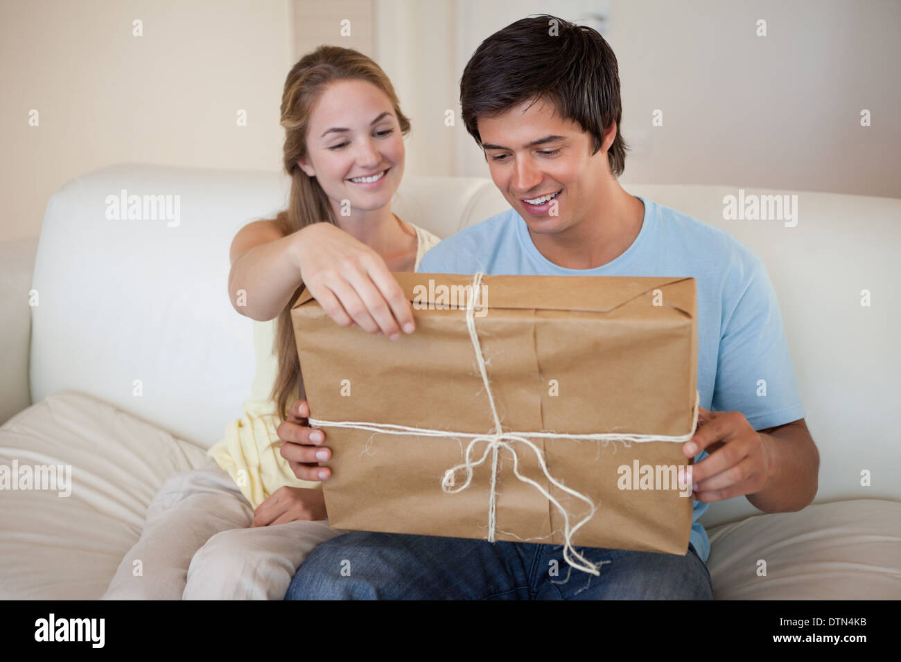 Opening packet hi-res stock photography and images - Alamy
