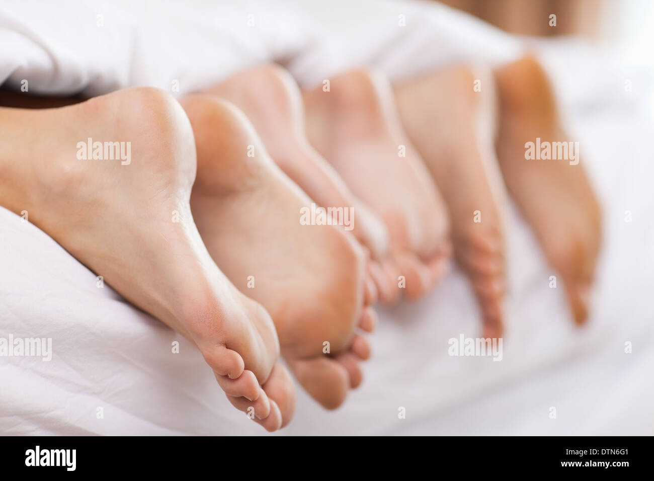 Family feet foot three people hi-res stock photography and images - Alamy