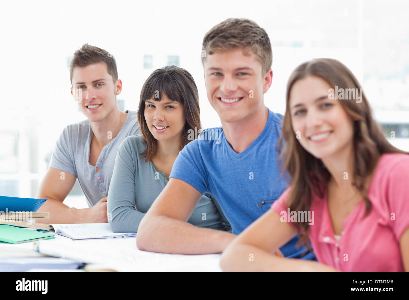 Four people looking hi-res stock photography and images - Alamy