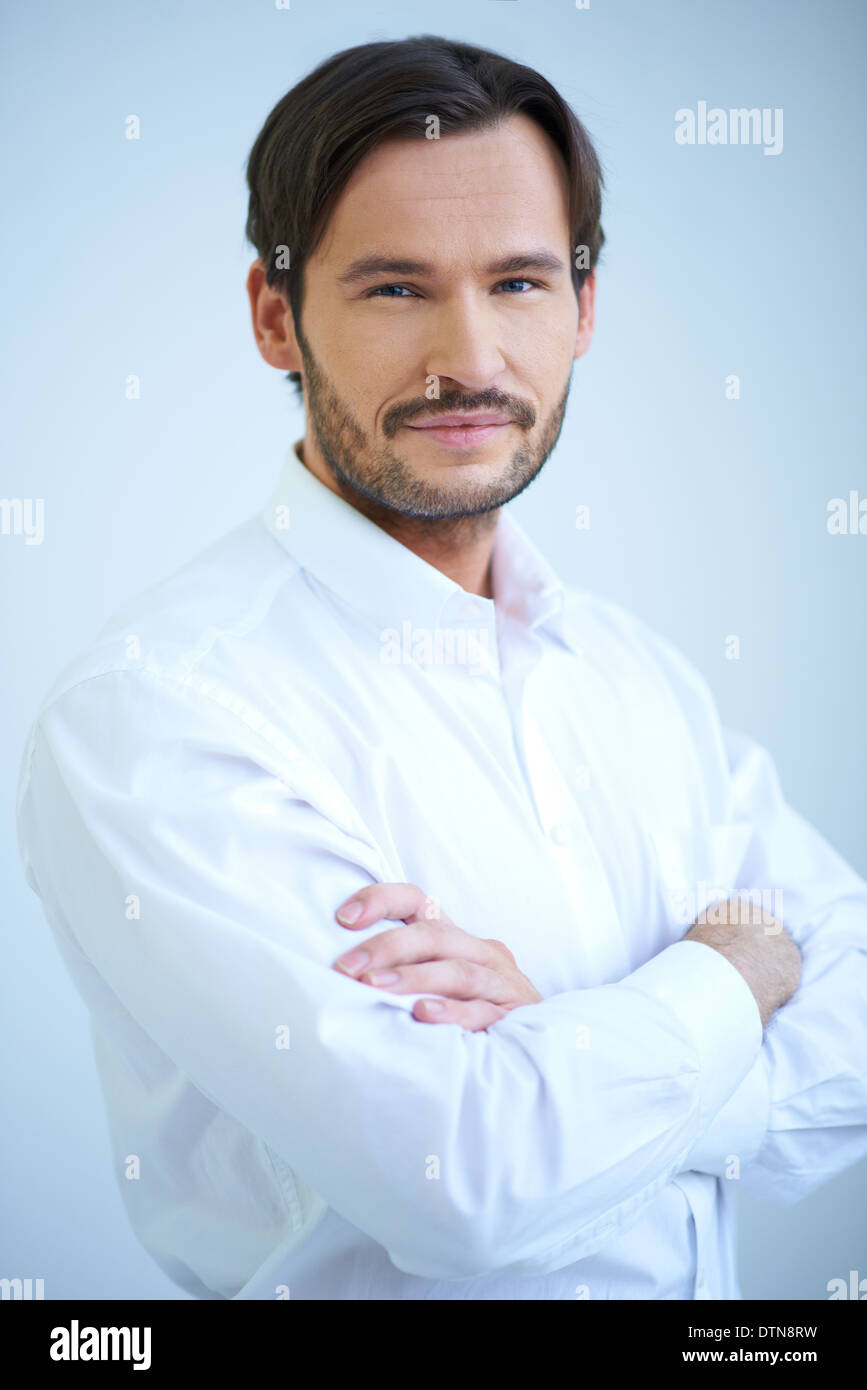 Smiling man in shirtsleeves Stock Photo - Alamy