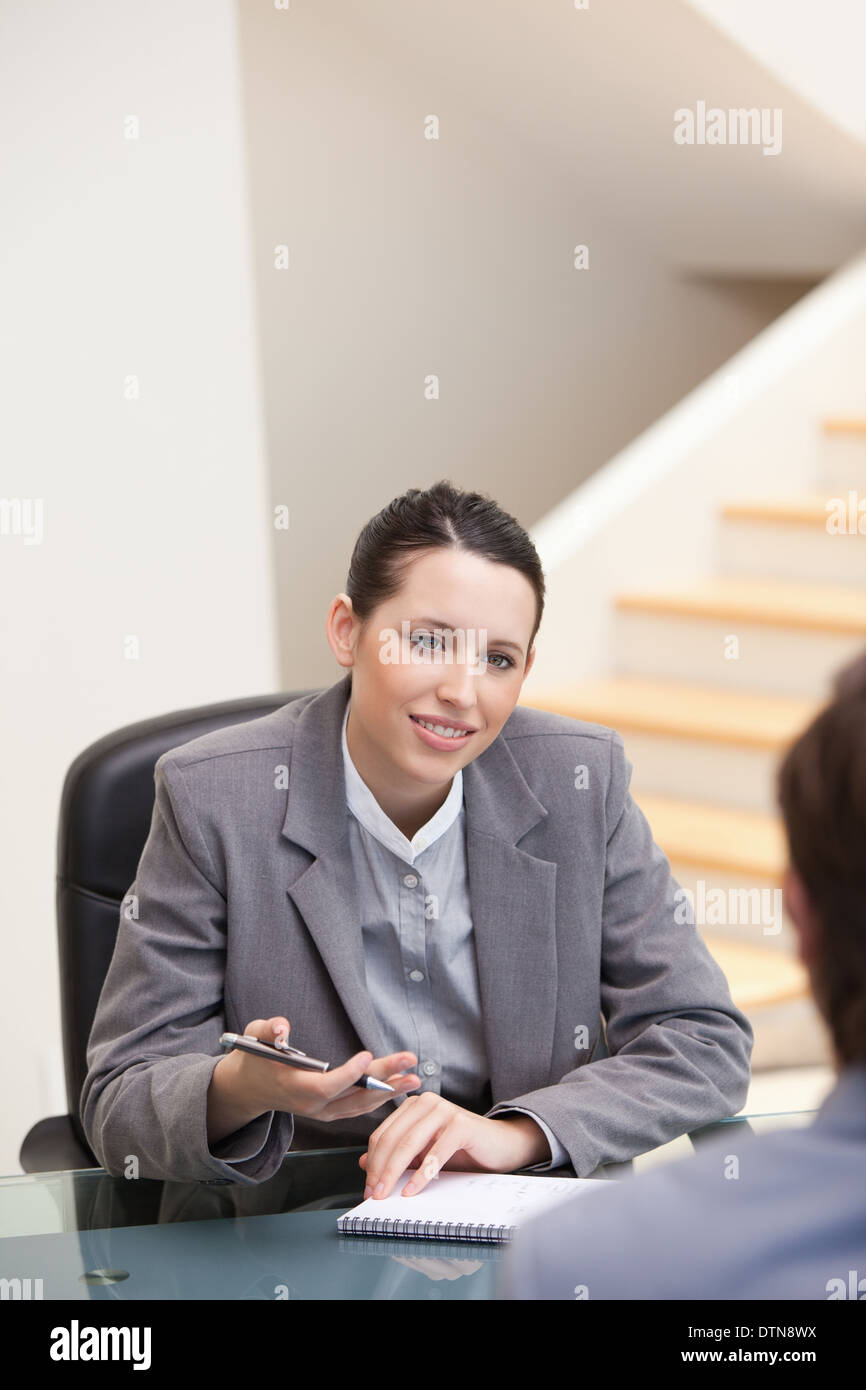 Business man explaining something woman hi-res stock photography and ...