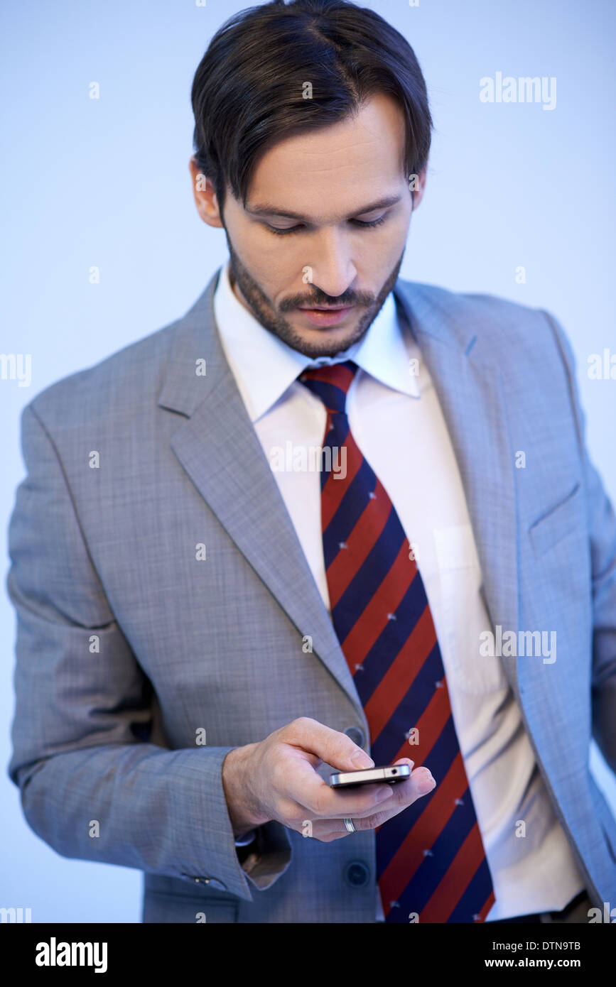 Businessman making a mobile phone call Stock Photo - Alamy