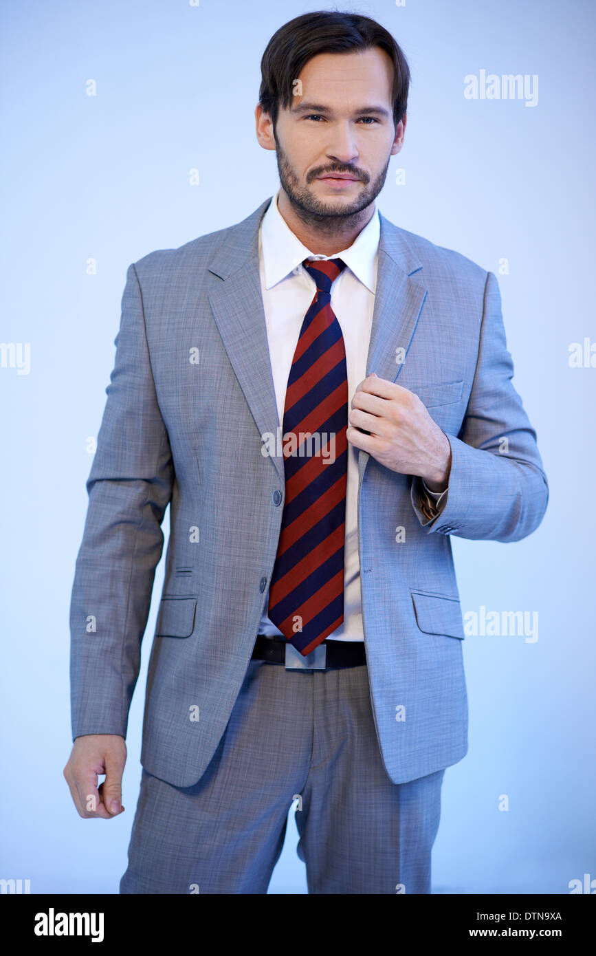 Grey suit hi-res stock photography and images - Alamy
