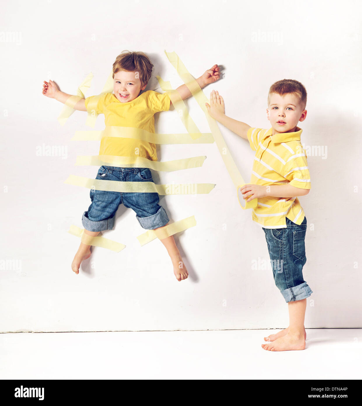 Two cute little brothers having great fun Stock Photo - Alamy