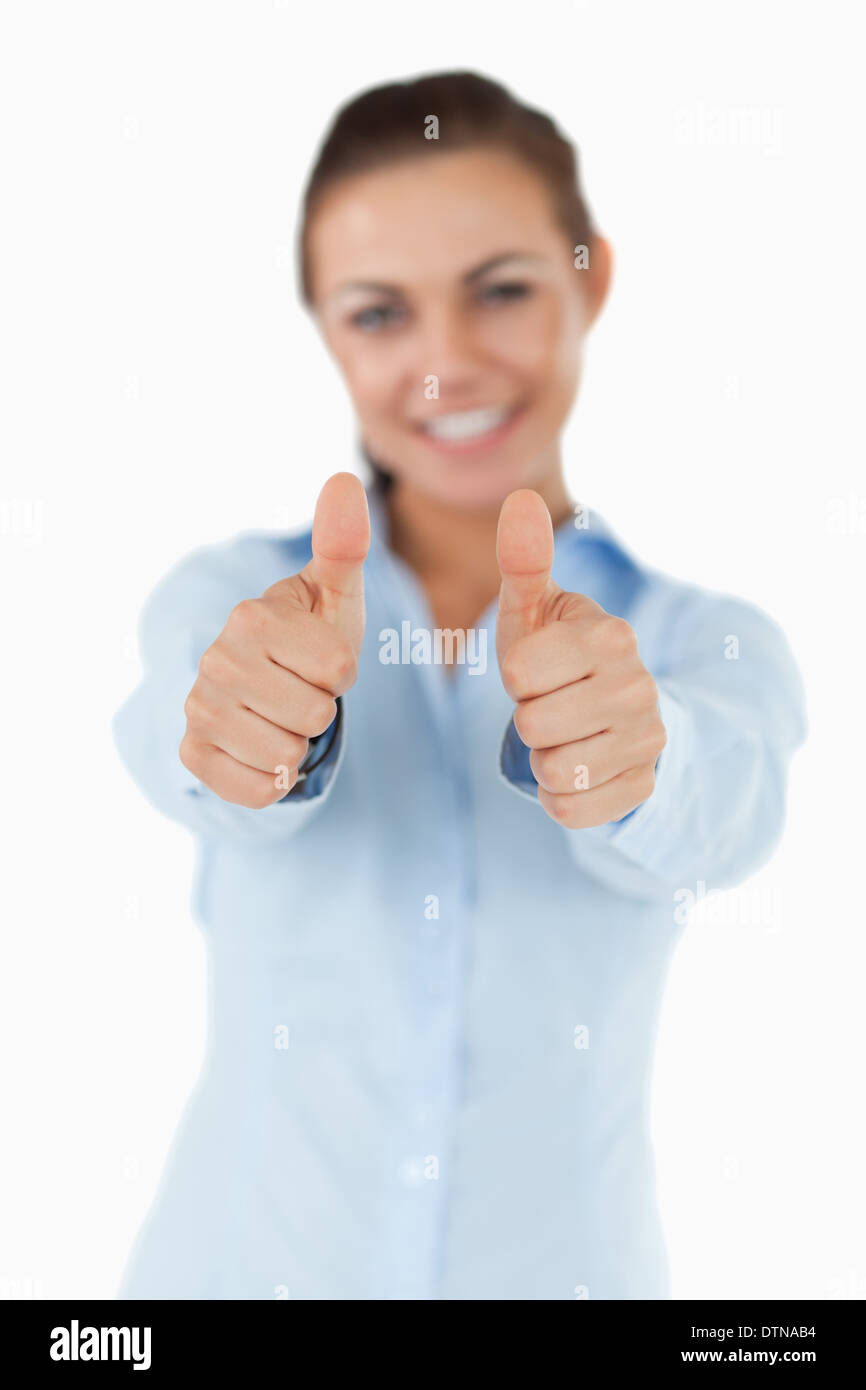 Smiling businesswoman giving her approval Stock Photo - Alamy