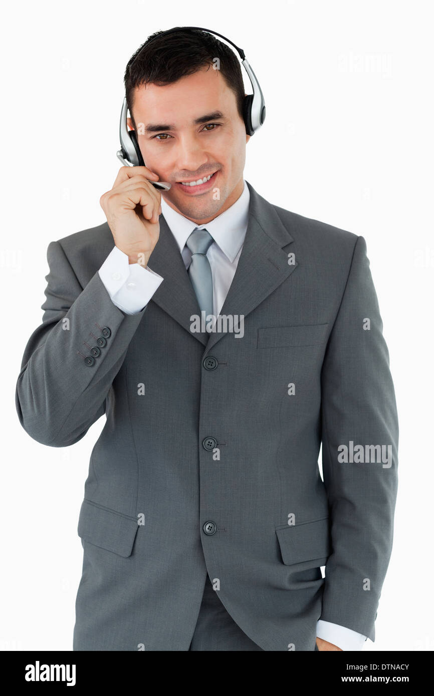 Male call center agent with headset on Stock Photo - Alamy