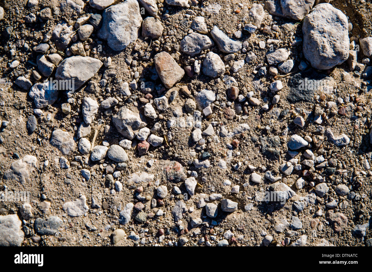 Dry soil and stones of an agricultural field Stock Photo - Alamy