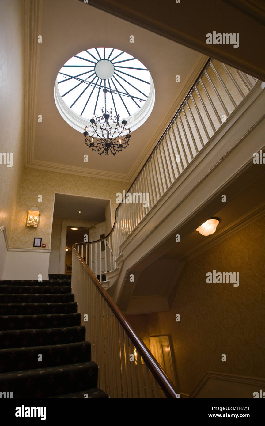 Stairway with chandelier at The Talbot Hotel in Malton North Yorkshire ...