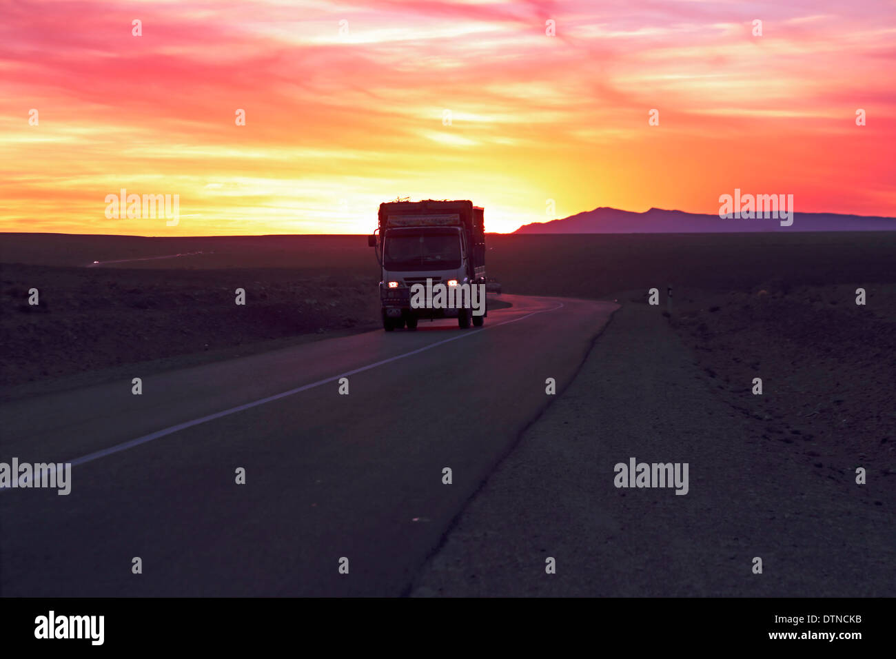 Car driving through desert road hi-res stock photography and images - Alamy