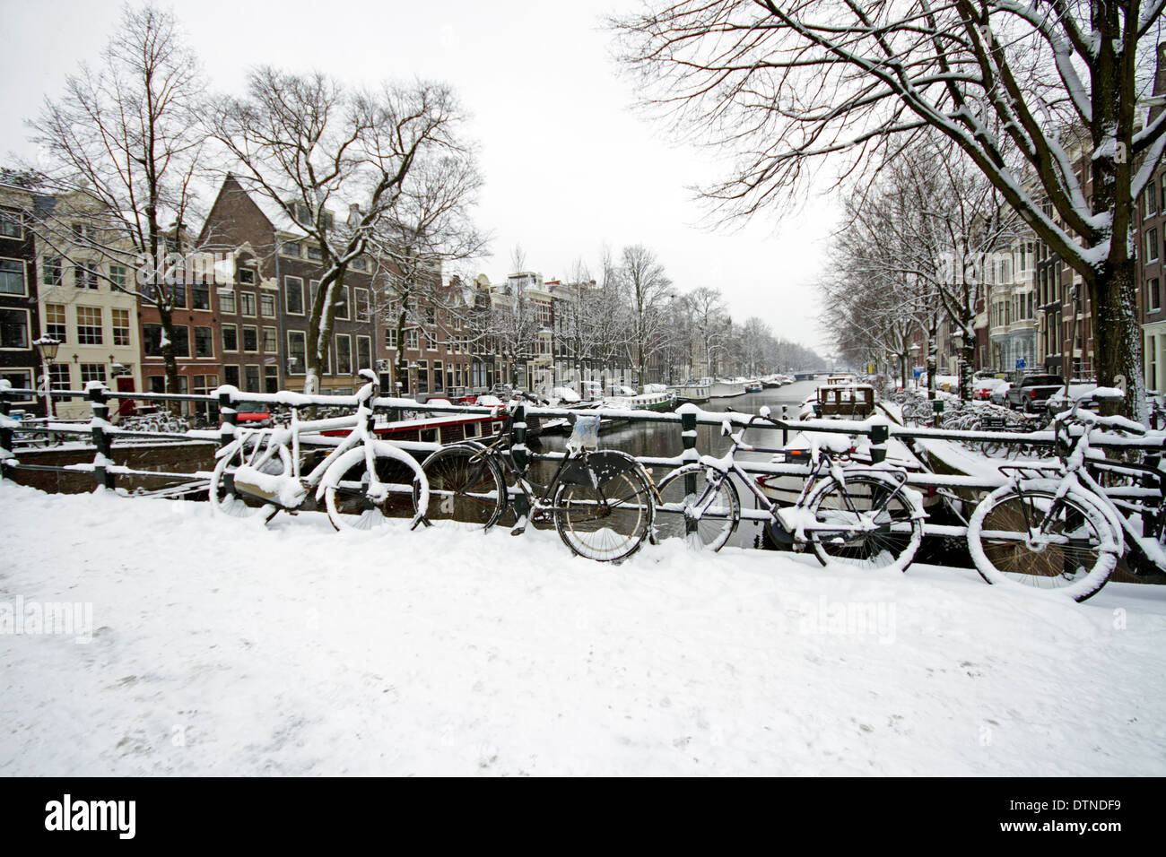 Amsterdam covered with snow in winter in the Netherlands Stock Photo ...