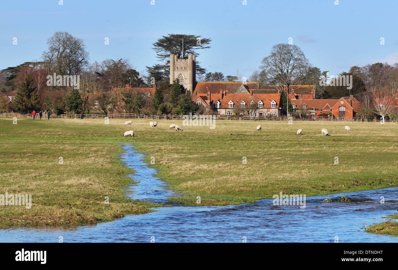 An English Rural Hamlet bathed in Winter sunshine with grazing Sheep ...