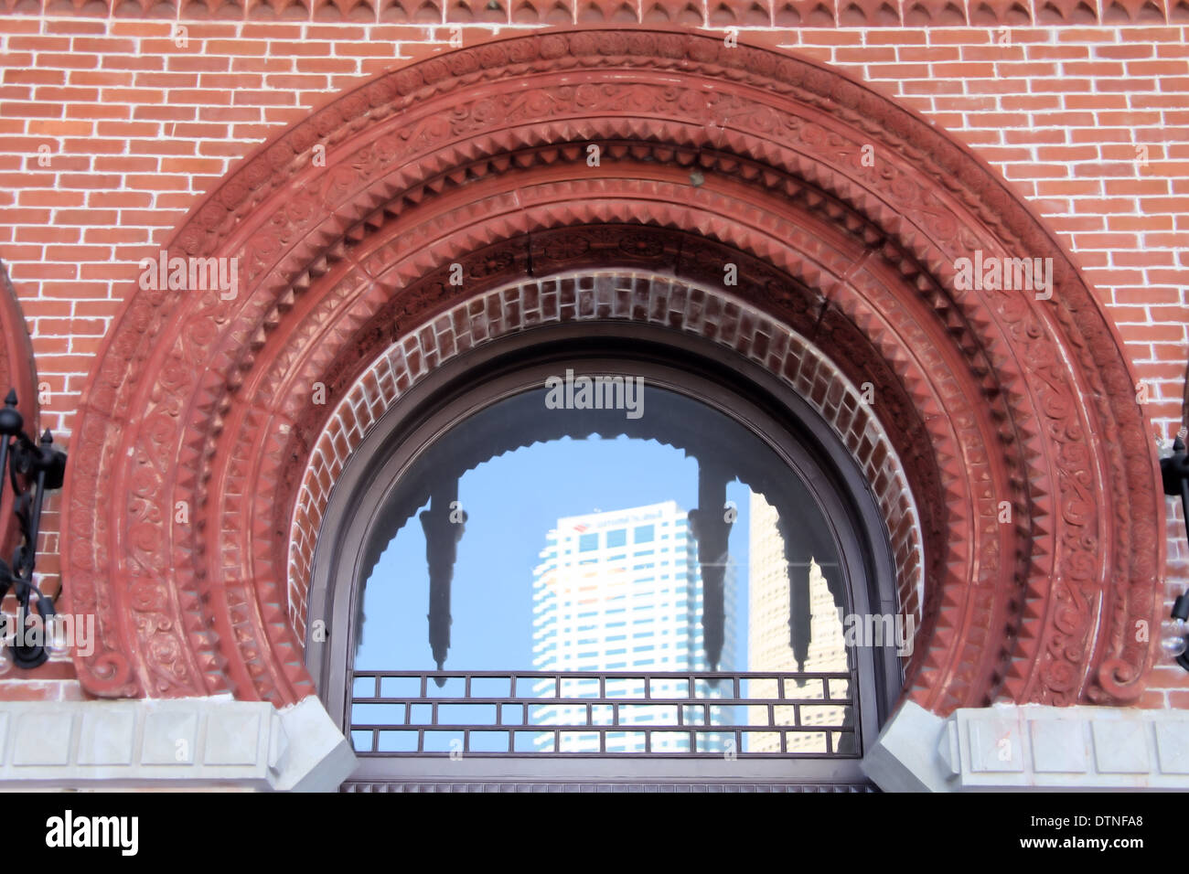 WINDOW ARCH WITH REFLECTIONS ON GLASS PANE Stock Photo - Alamy