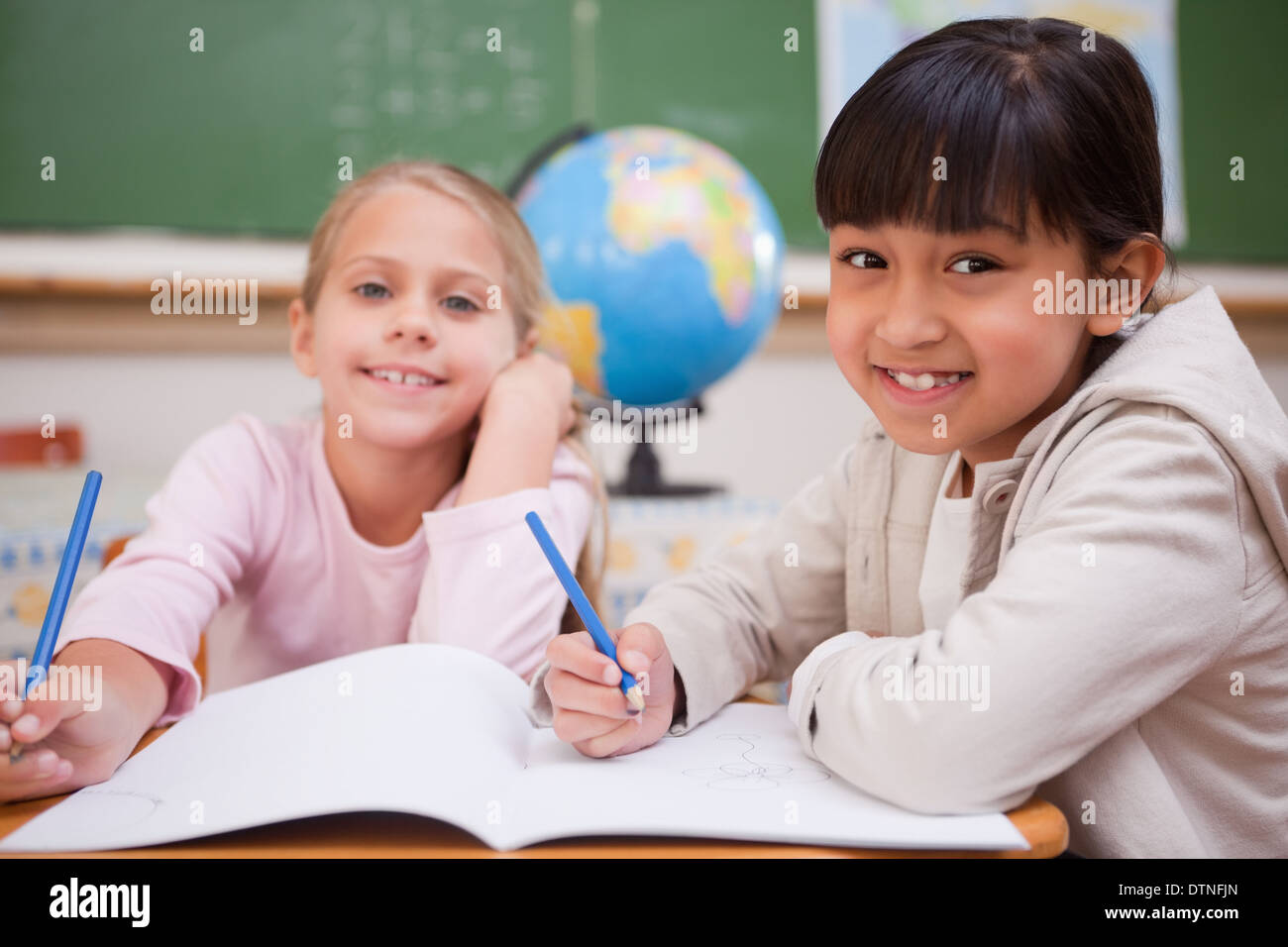 Student doing classwork hi-res stock photography and images - Alamy