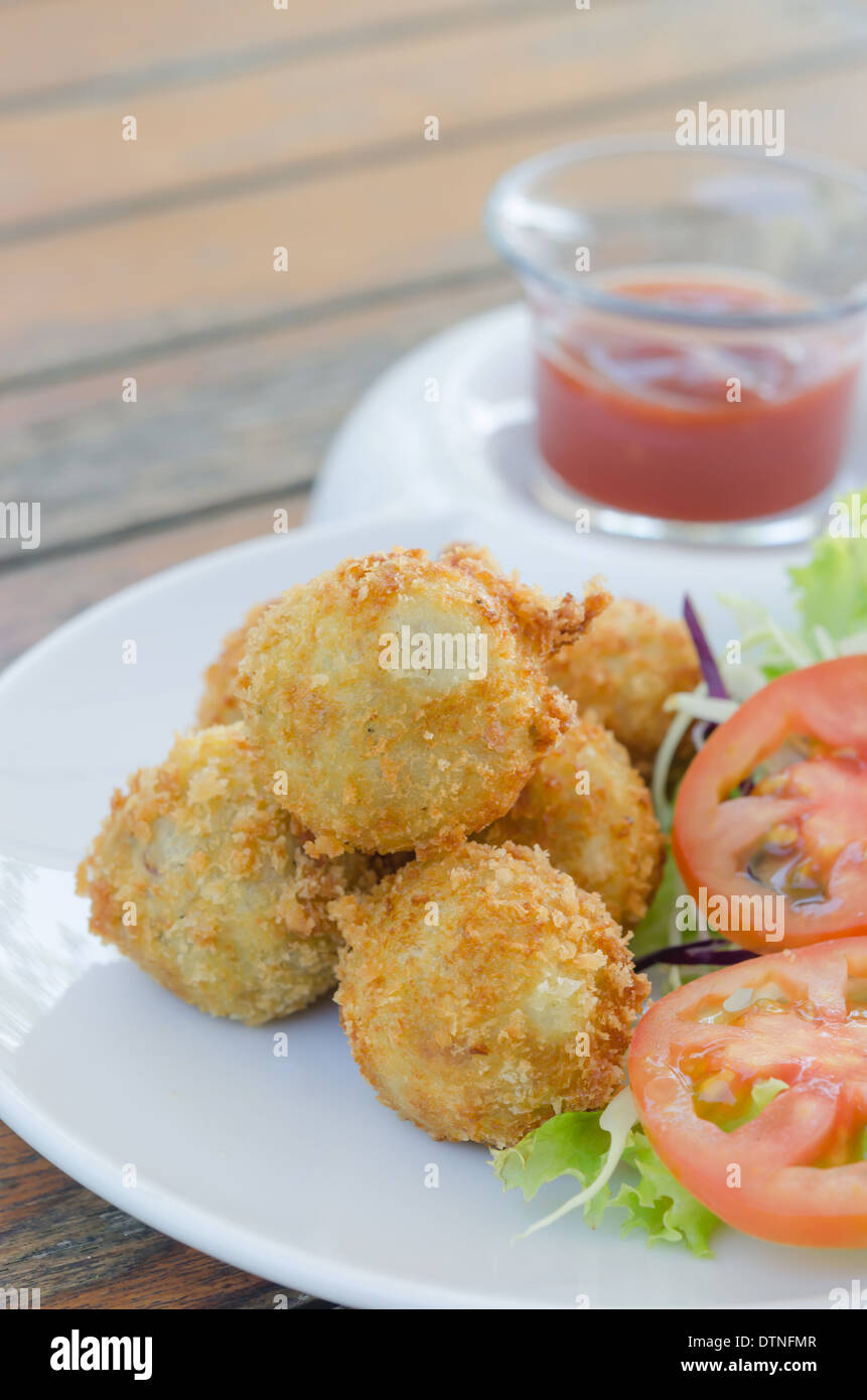 Deep Fried Potato Croquettes served with tomato sauce and fresh ...