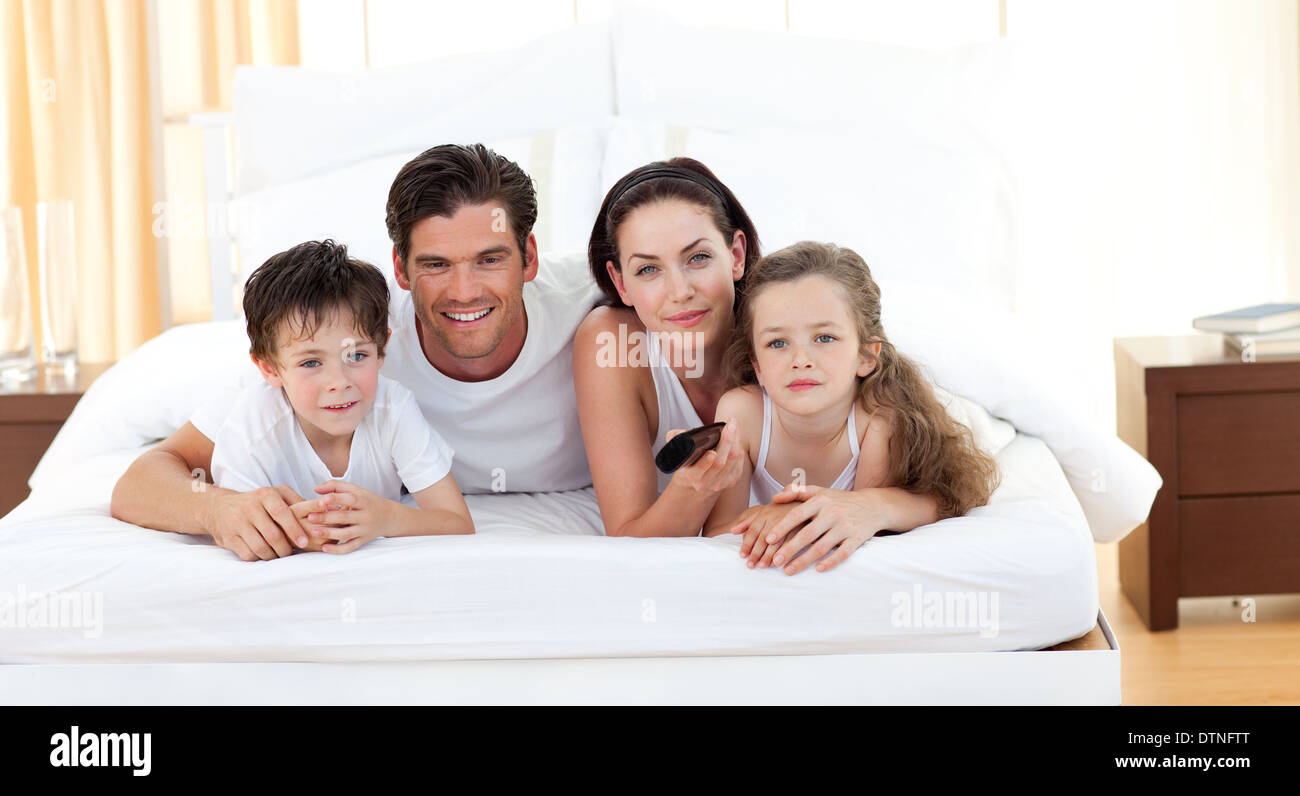 Cute siblings and their parents Stock Photo - Alamy