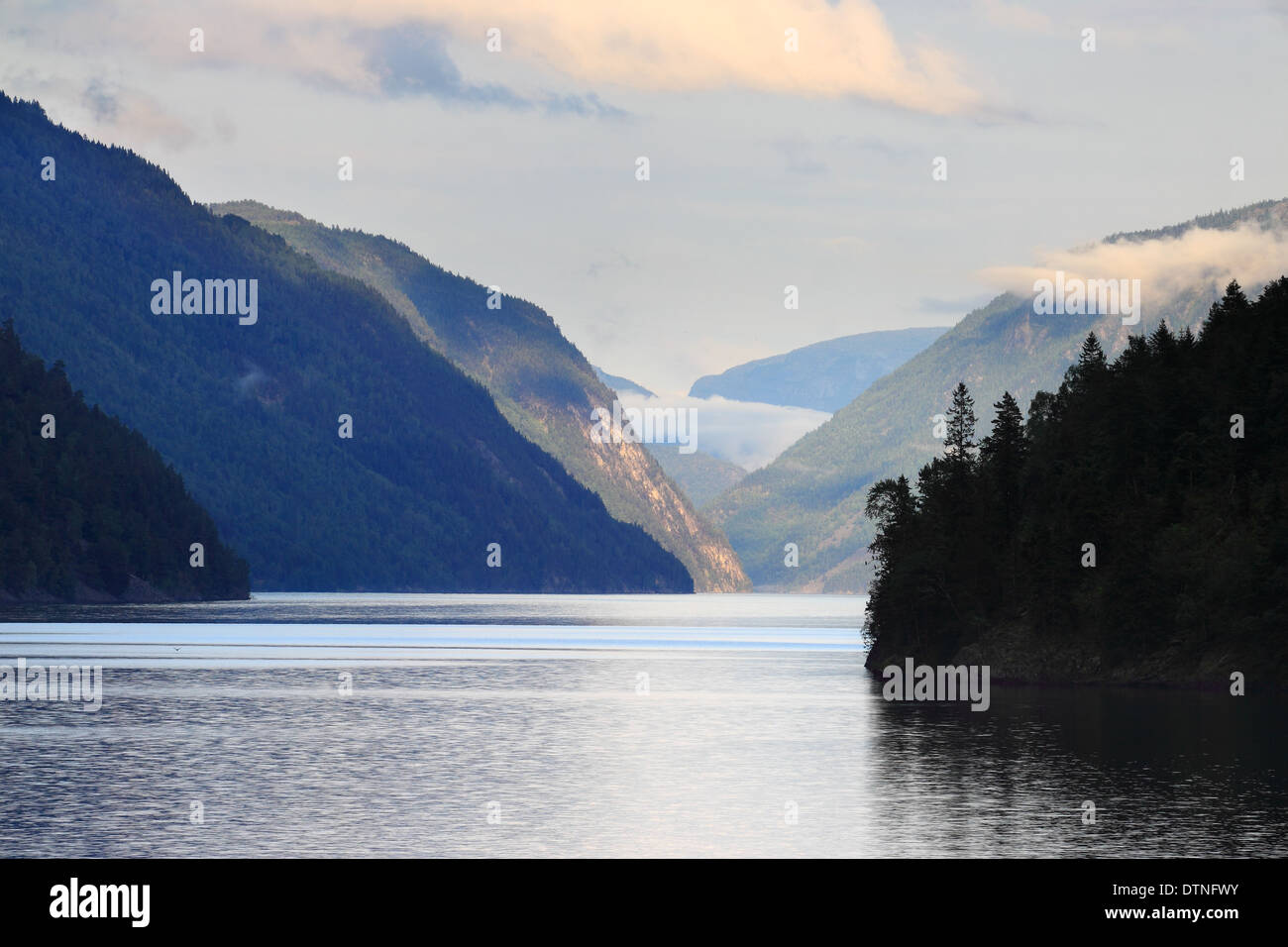 Mountains recede into the distance at Lake Bandak is in the ...