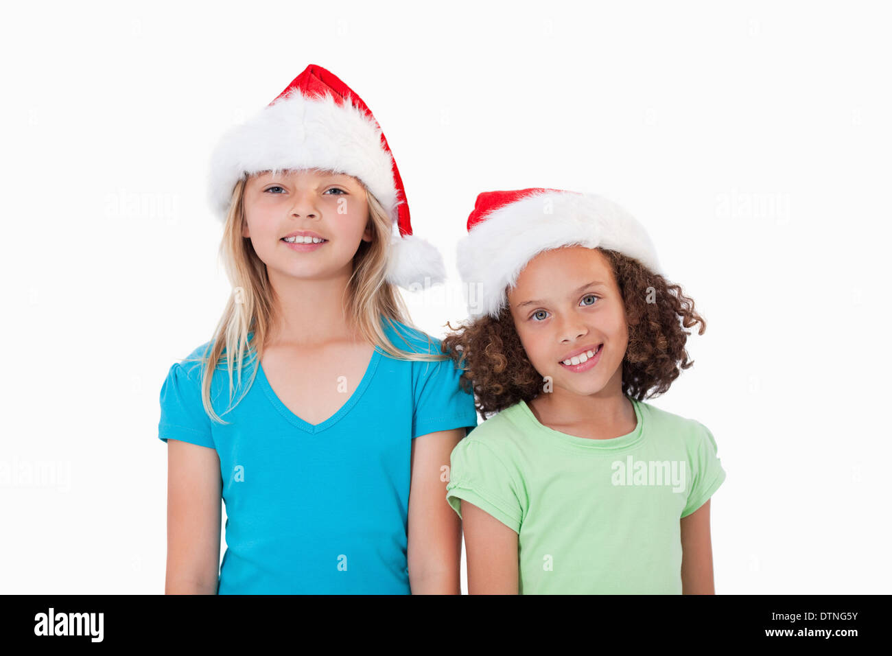 Two girls posing christmas hi-res stock photography and images - Alamy