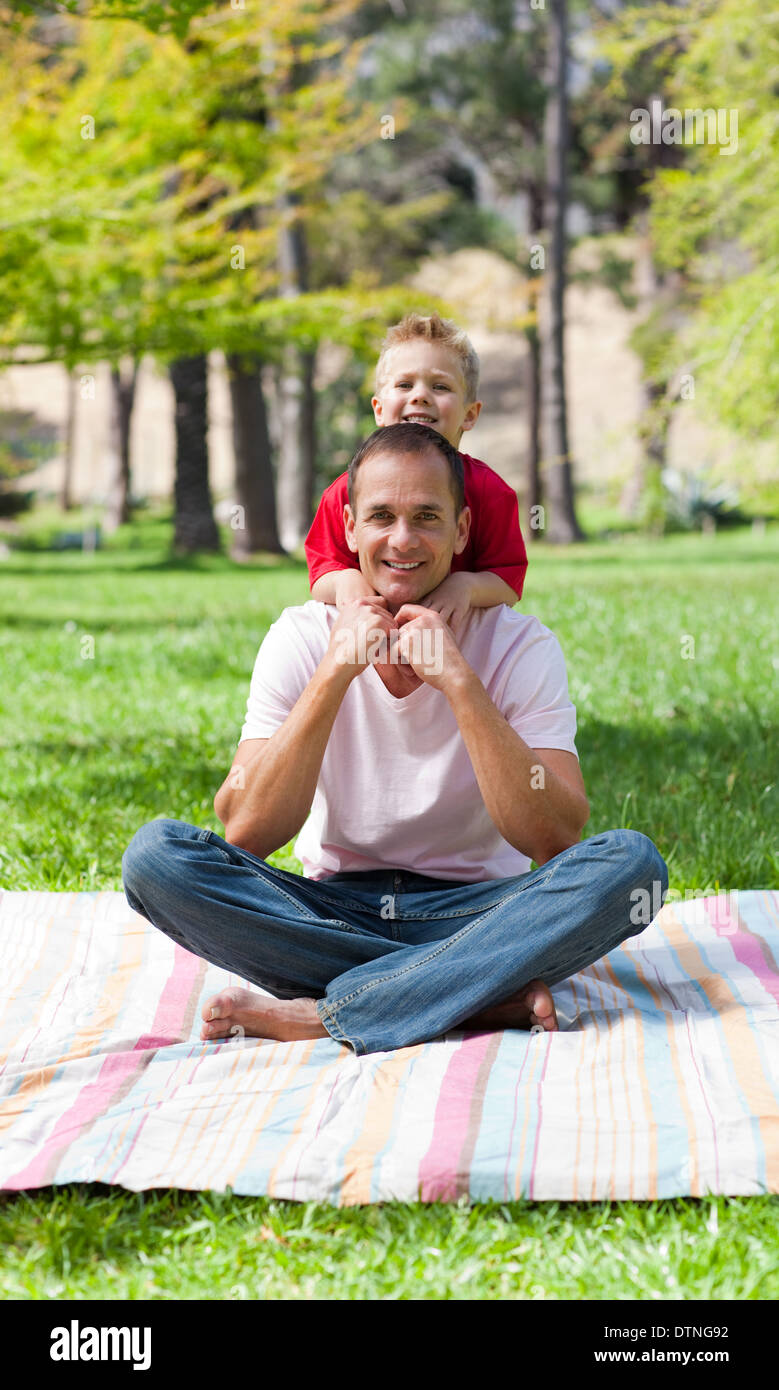 Cute little boy hugging his father Stock Photo - Alamy