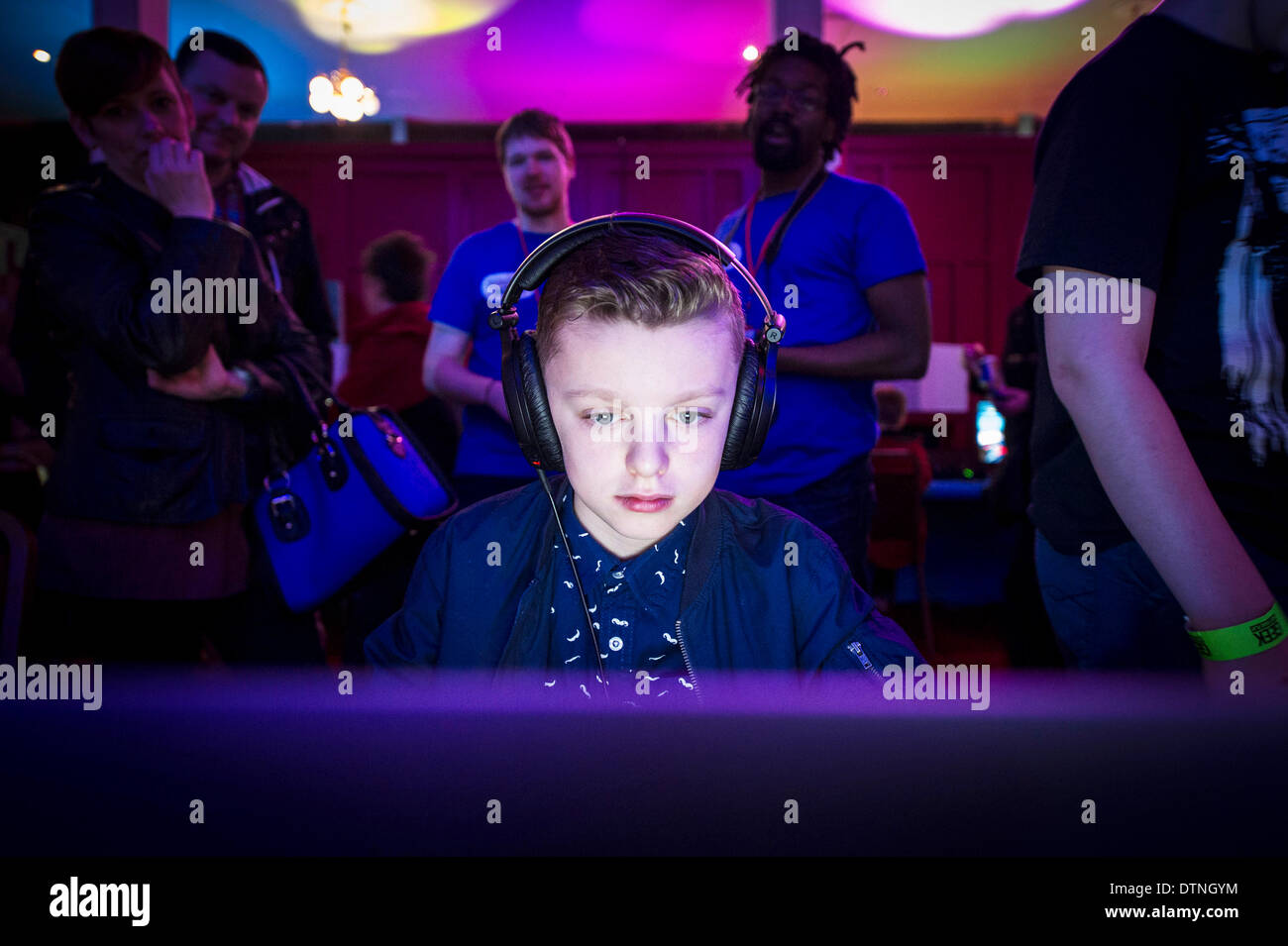 Margate, Kent, UK. 21st February, 2014. A young gamer intensely ...