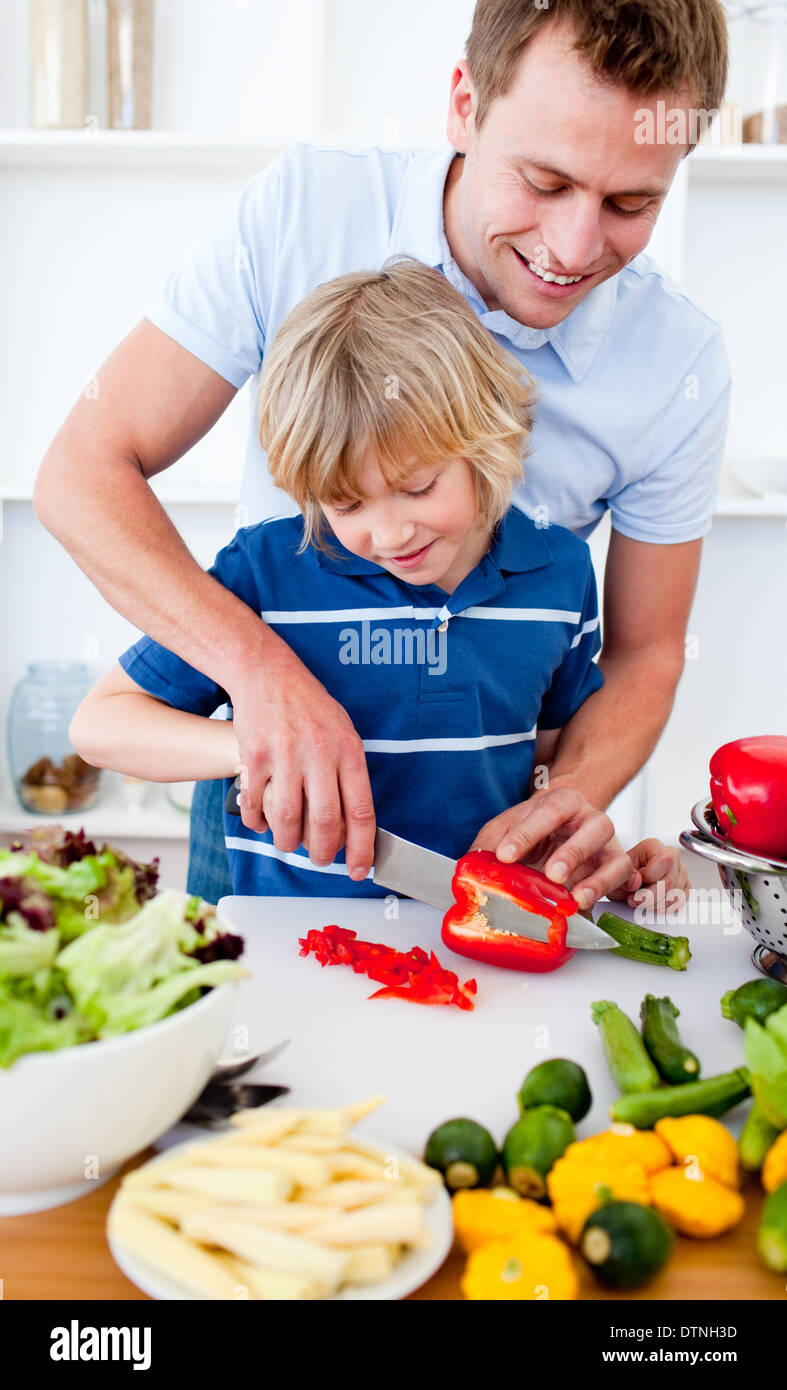 Jolly father and his son cooking Stock Photo - Alamy