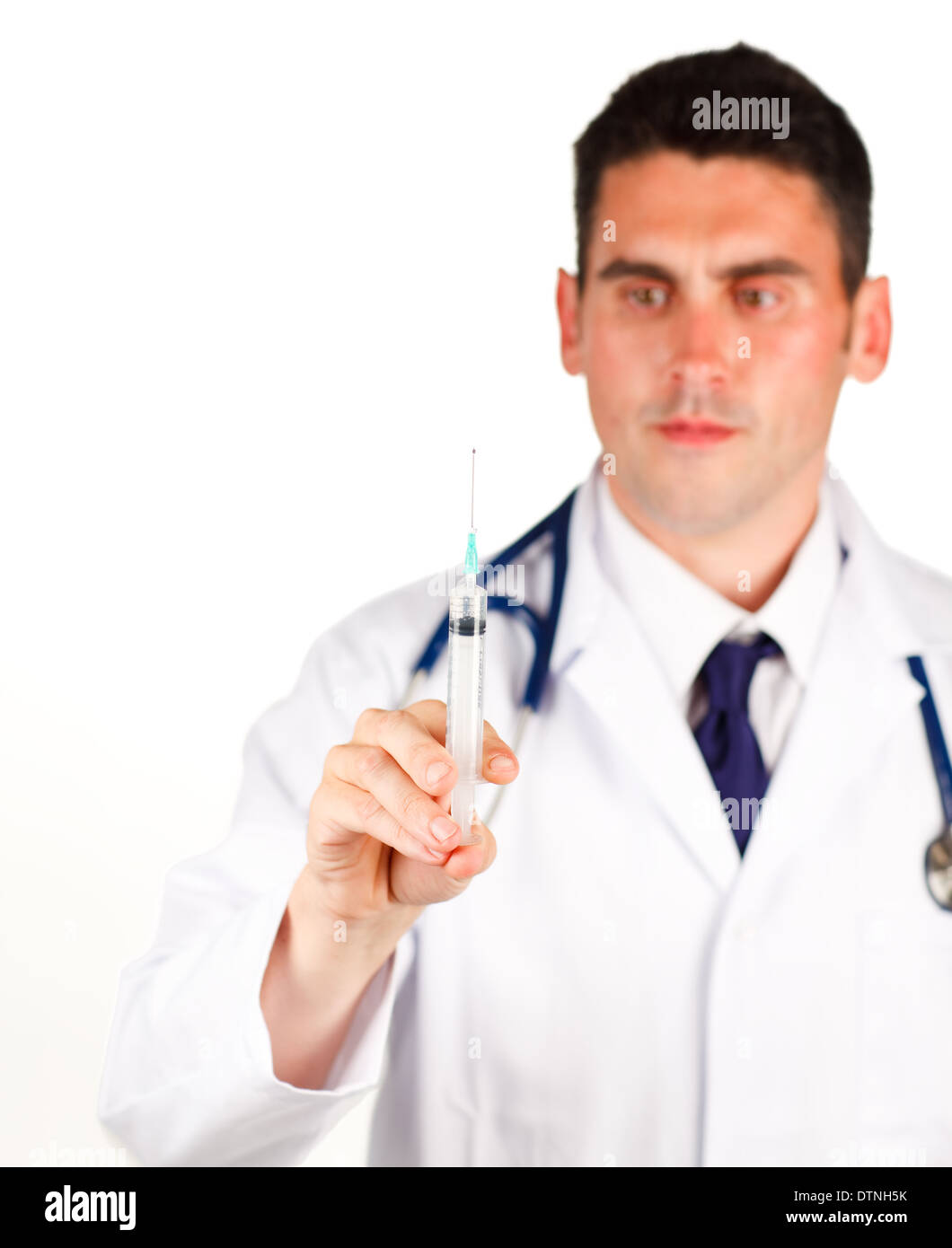 Young doctor holding an injection Stock Photo - Alamy