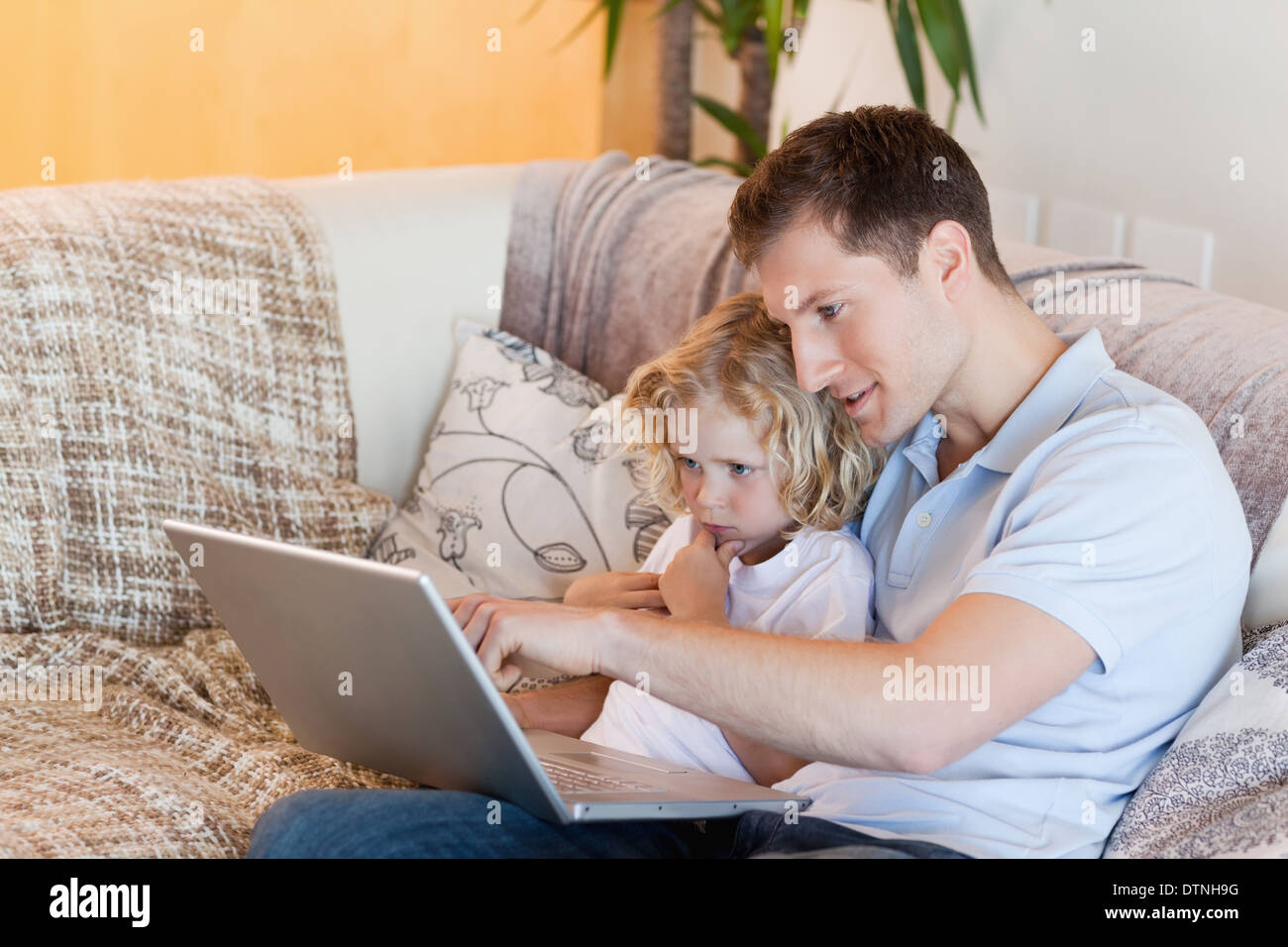 Father explaining his son the internet Stock Photo - Alamy