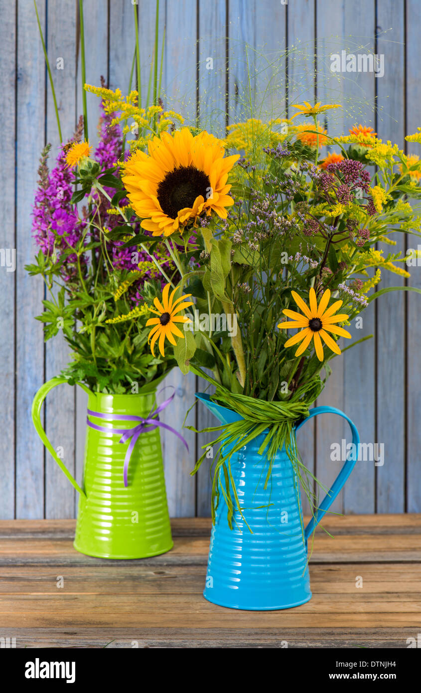 Sunflowers in watering can hi-res stock photography and images - Alamy
