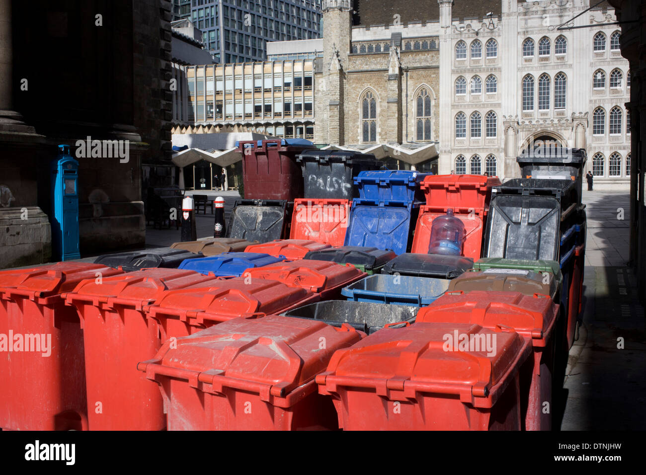 Waste bins arranged in the street opposite the City of London's ...