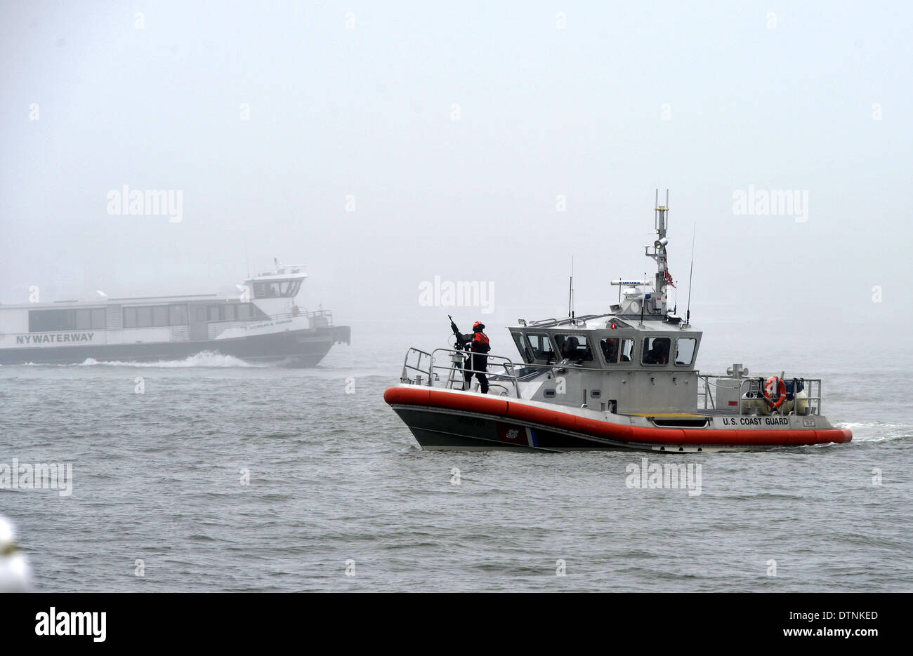 New York, USA. 21st Feb, 2014. A U.S. Coast Guard ship patrols near the ...