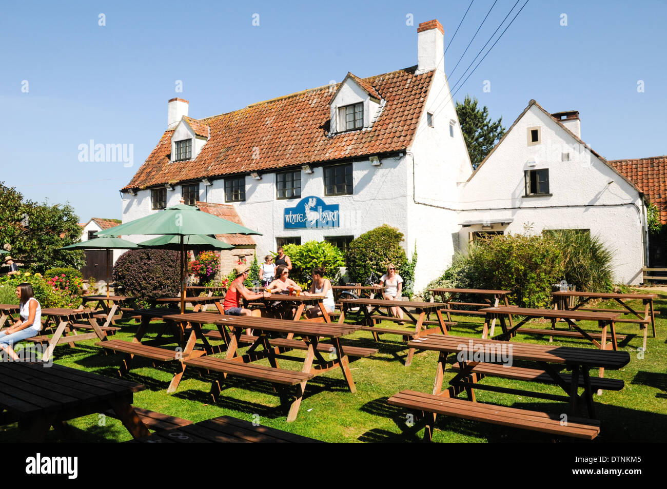 View of the front of the pretty and popular White Hart pub in the ...