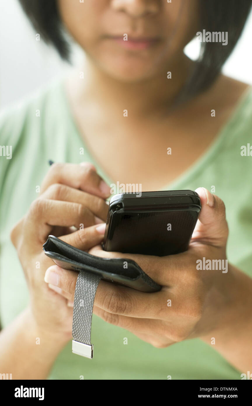 woman using smartphone Stock Photo - Alamy