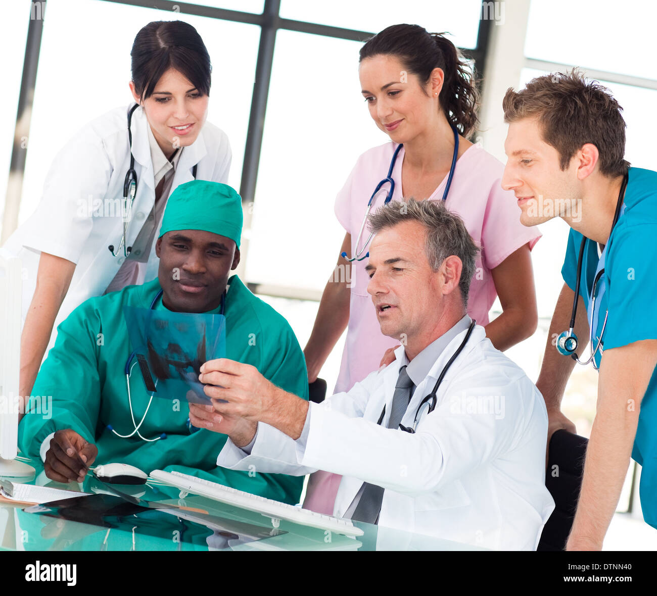 Medical team discussing in an office Stock Photo - Alamy