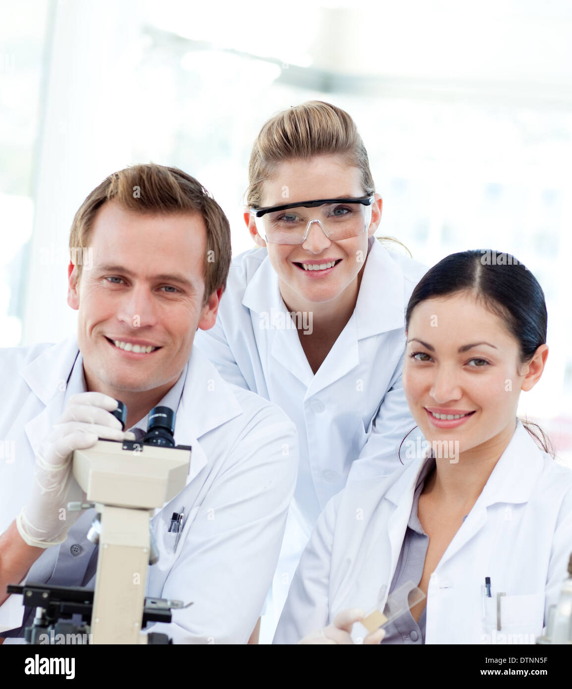 Portrait of a scientists with a microscope Stock Photo - Alamy