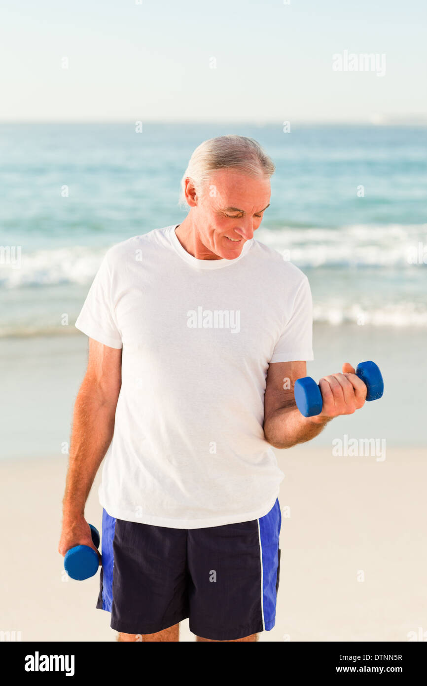 Older man doing exercise outdoors hi-res stock photography and images ...