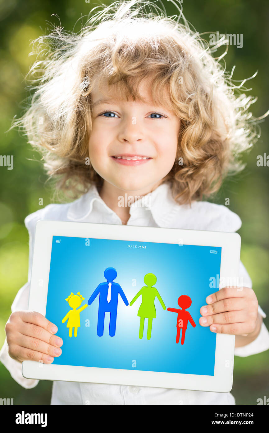 Child holding tablet PC Stock Photo - Alamy