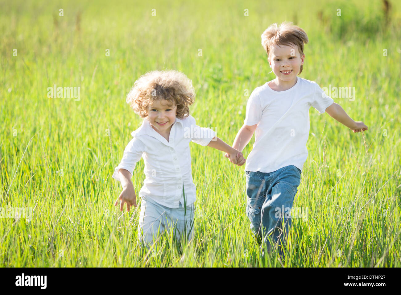 Children playing hi-res stock photography and images - Alamy