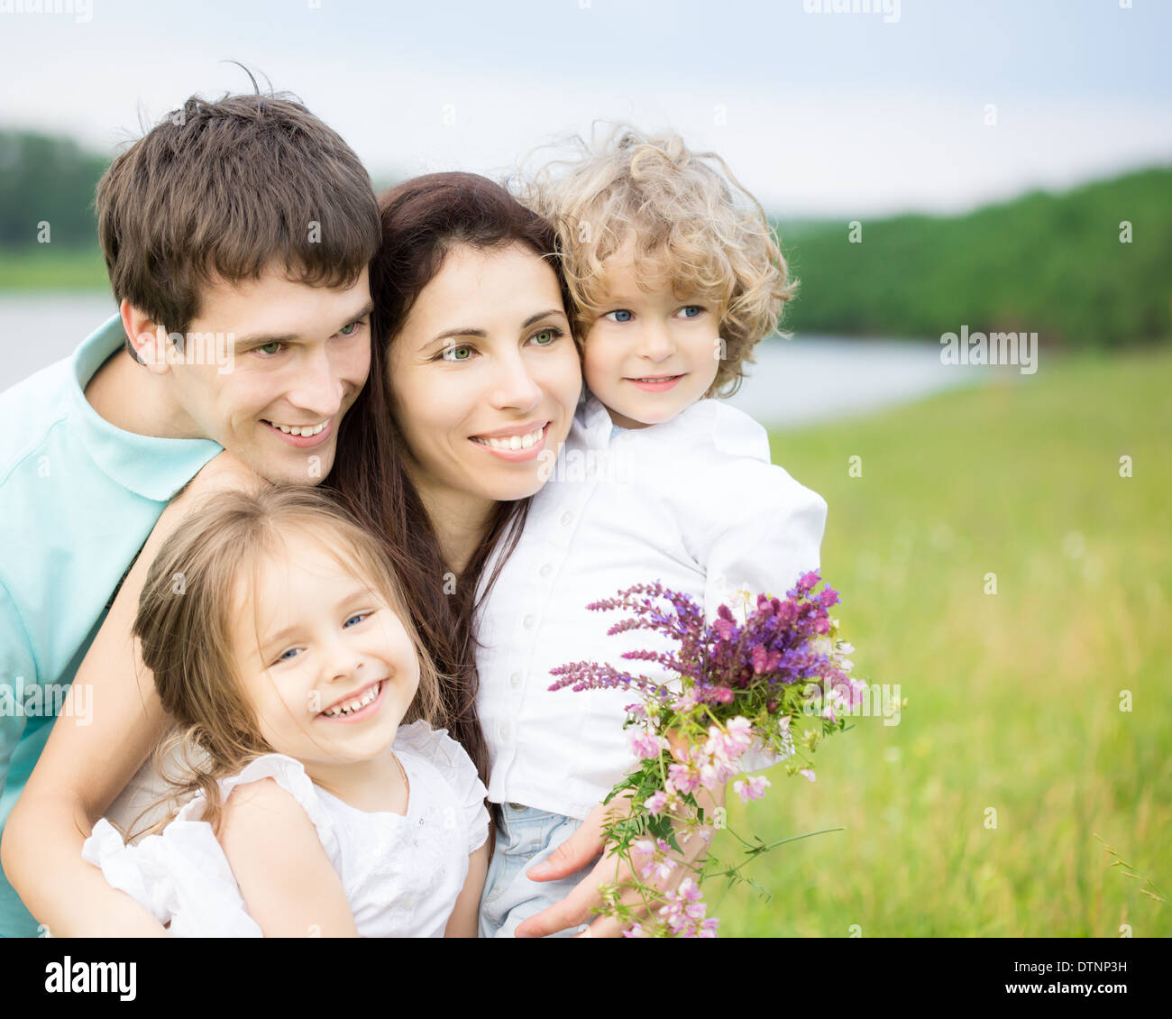 Happy healthy family outdoors hi-res stock photography and images - Alamy