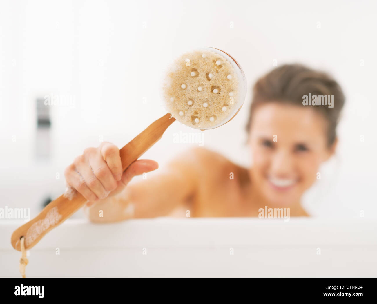 Woman body brush bath hi-res stock photography and images - Alamy