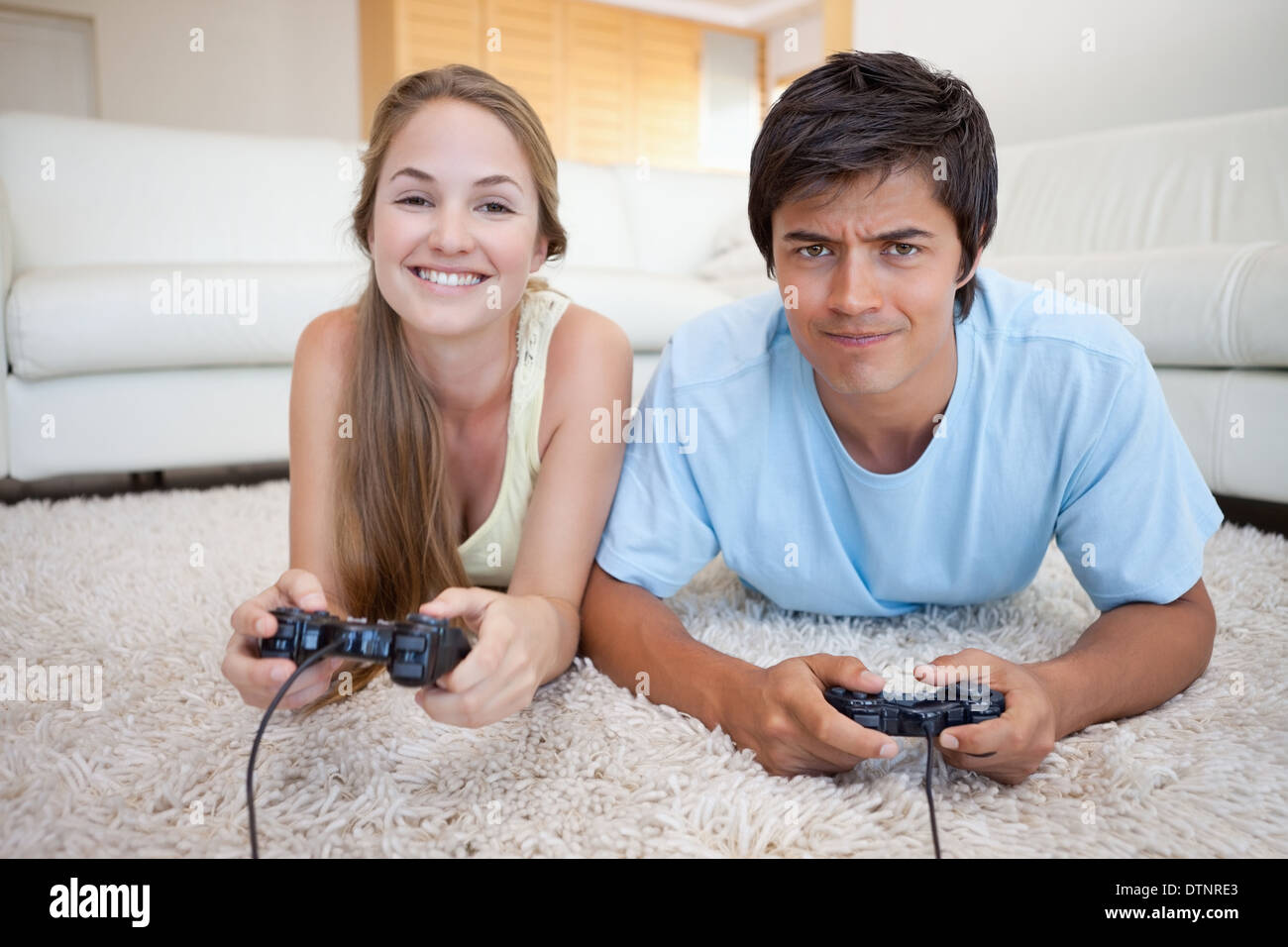 Women enjoying video games together hi-res stock photography and images ...