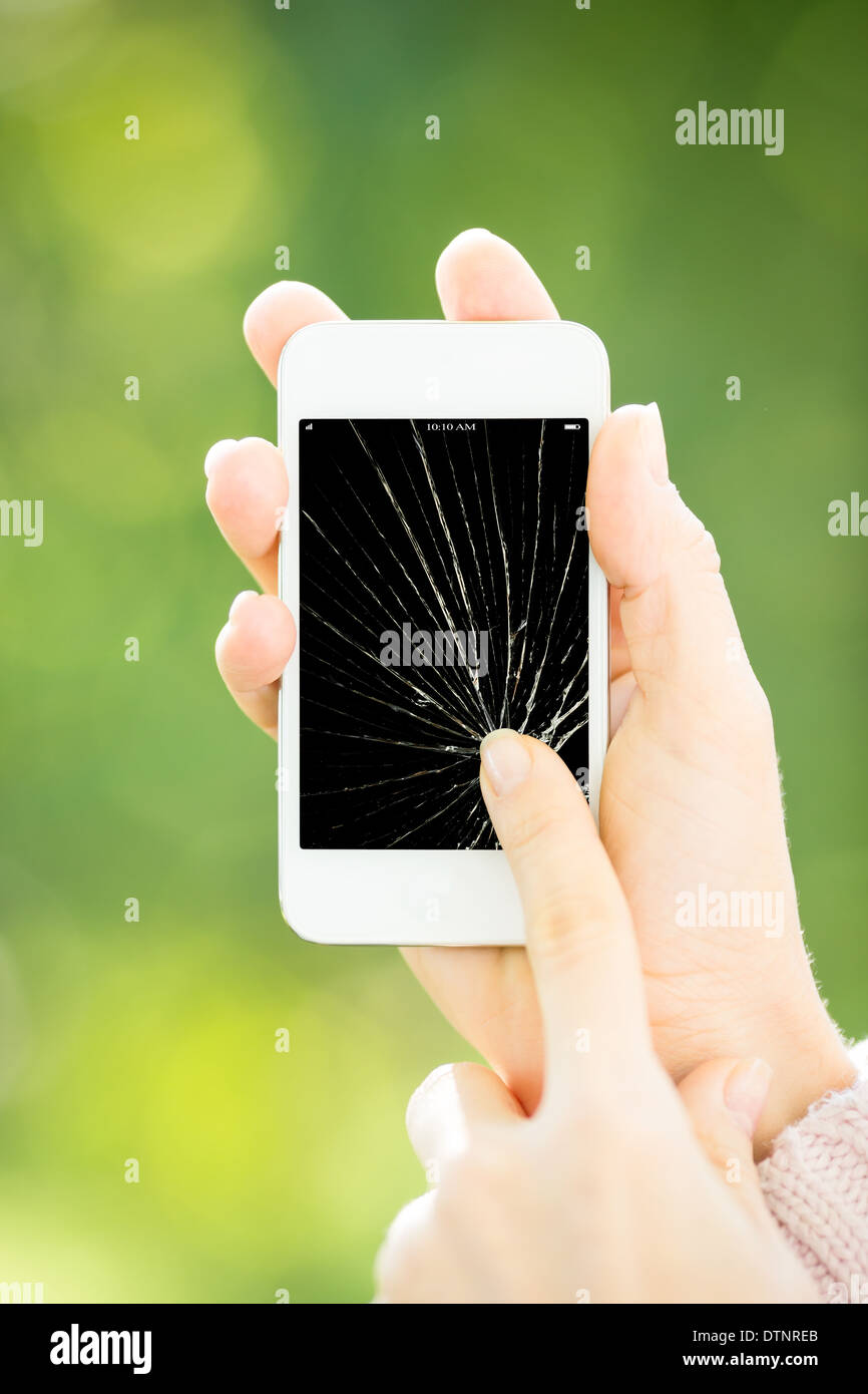 Woman holding smartphone Stock Photo - Alamy