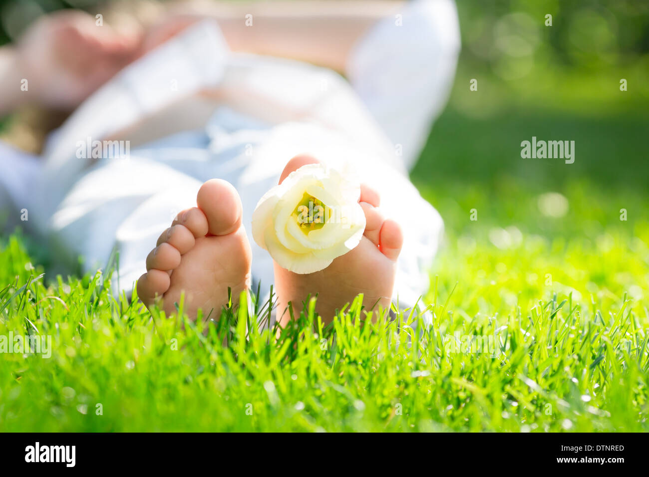 Feet with flower Stock Photo - Alamy