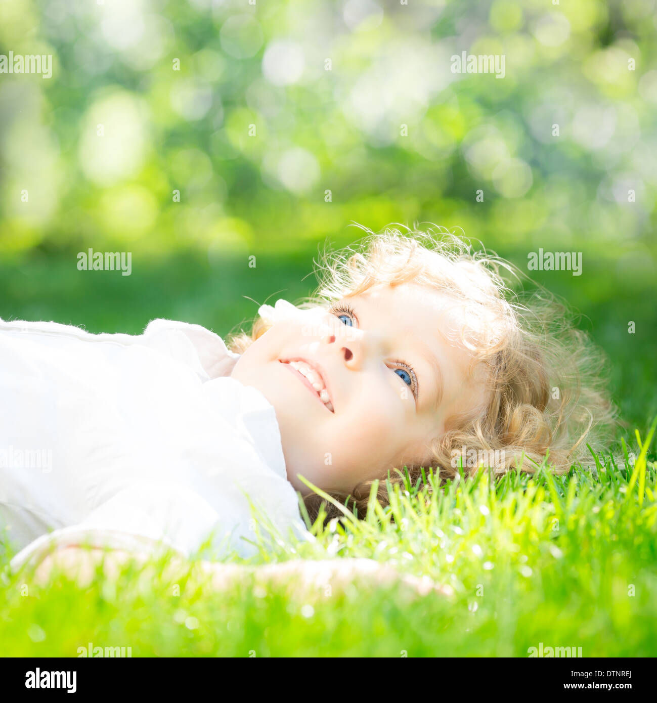 Child in spring park hi-res stock photography and images - Alamy