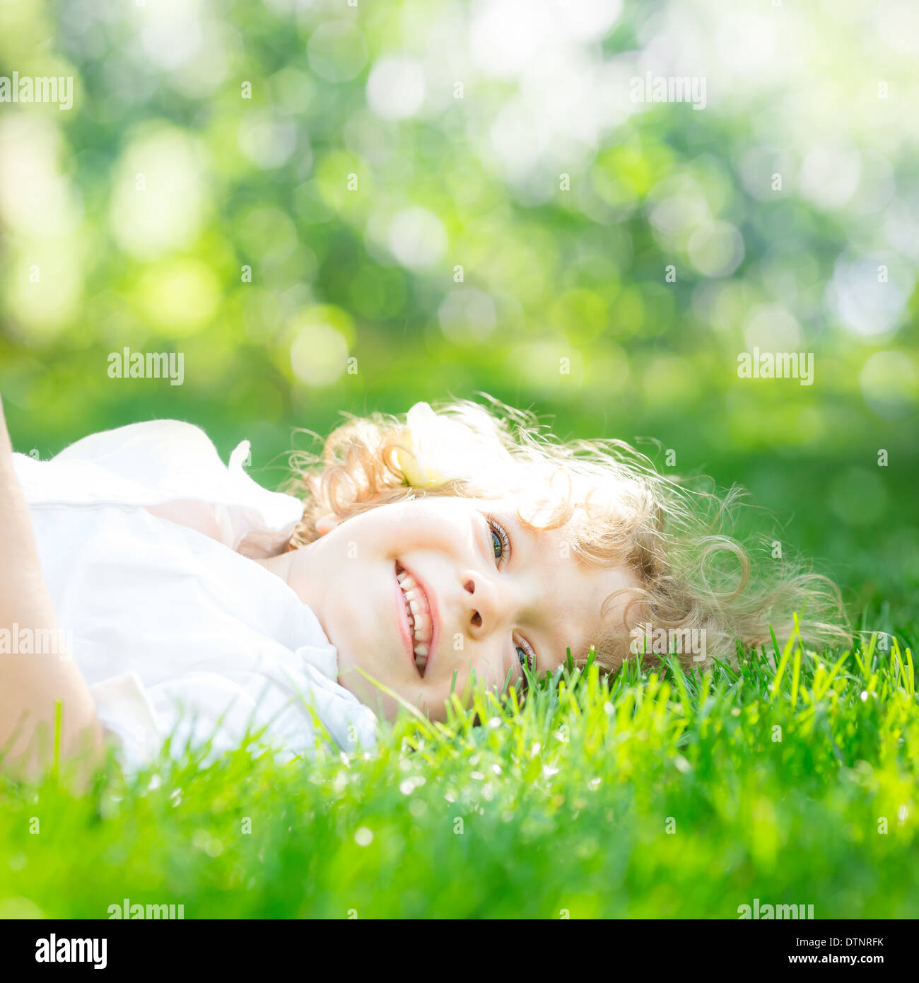 Child in spring park hi-res stock photography and images - Alamy