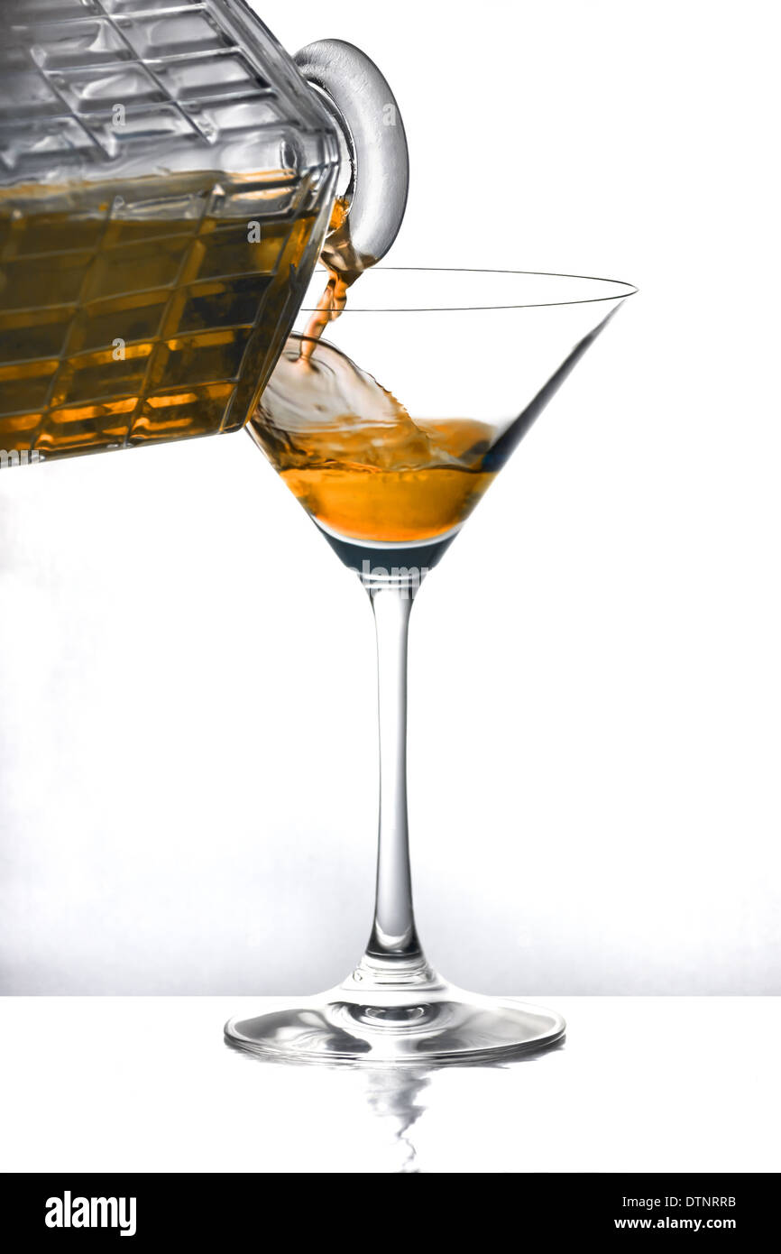 Yellow drink pouring hi-res stock photography and images - Alamy