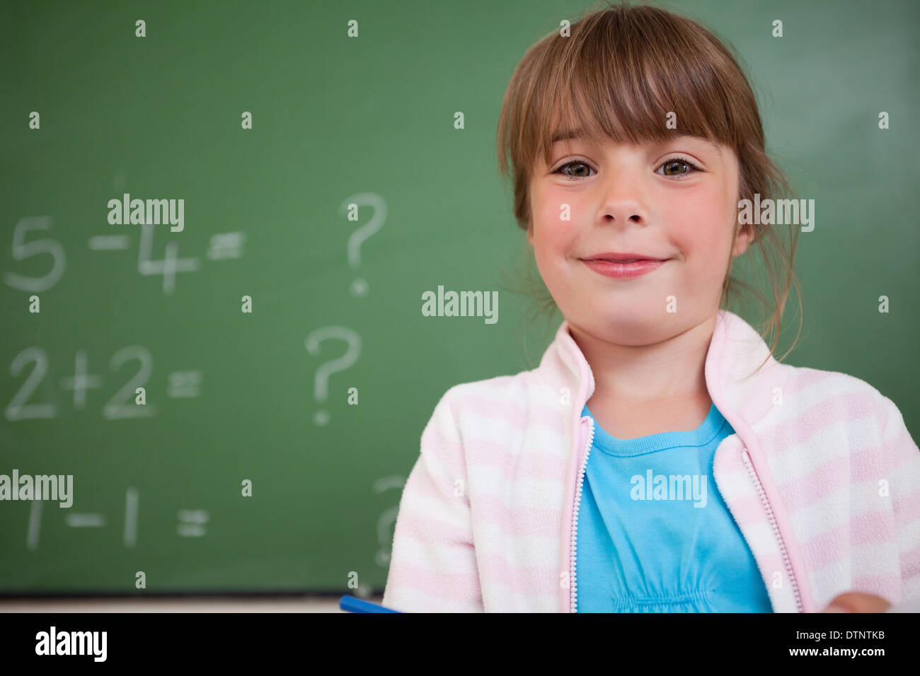 Little girl standing up Stock Photo - Alamy